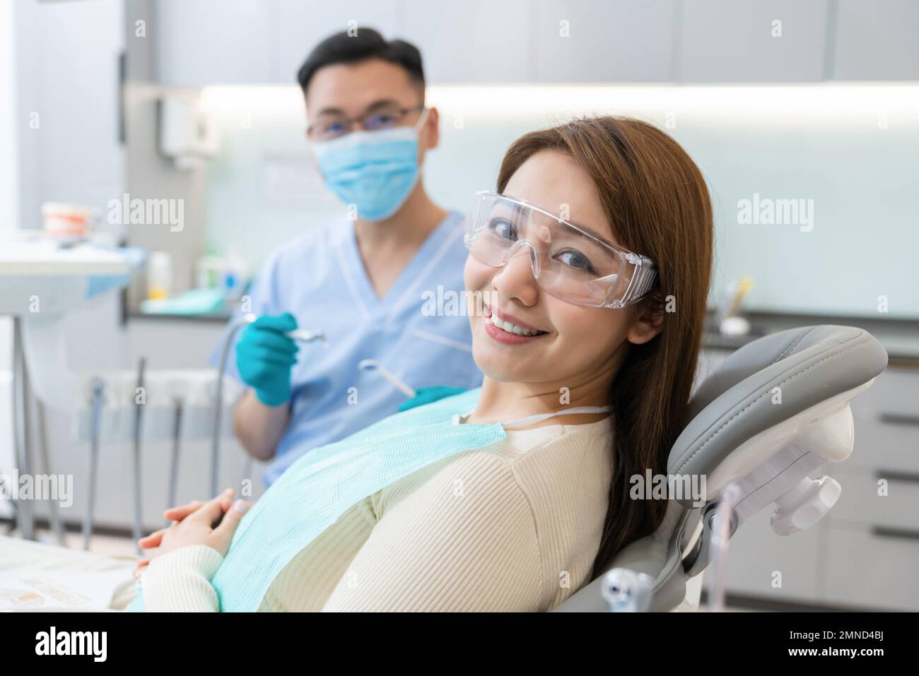 Doctors and patients in dental clinic Stock Photo - Alamy