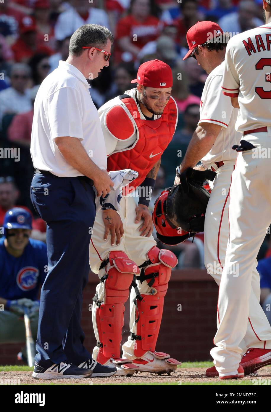 St. Louis Cardinals trainer Chris Conroy, left, and manager Mike ...