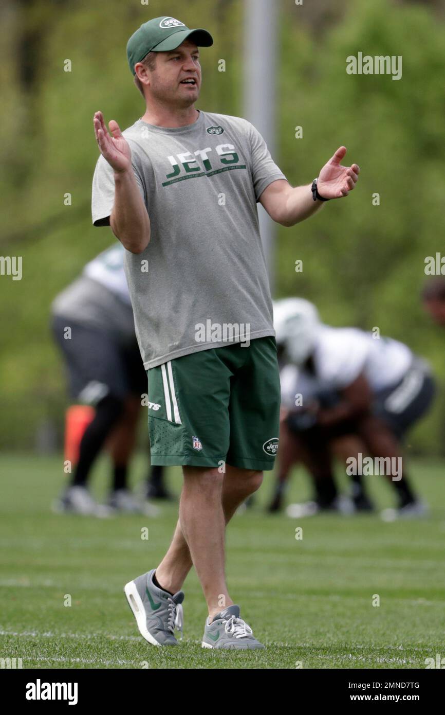 New York Jets offensive coordinator Jeremy Bates talks to his players ...