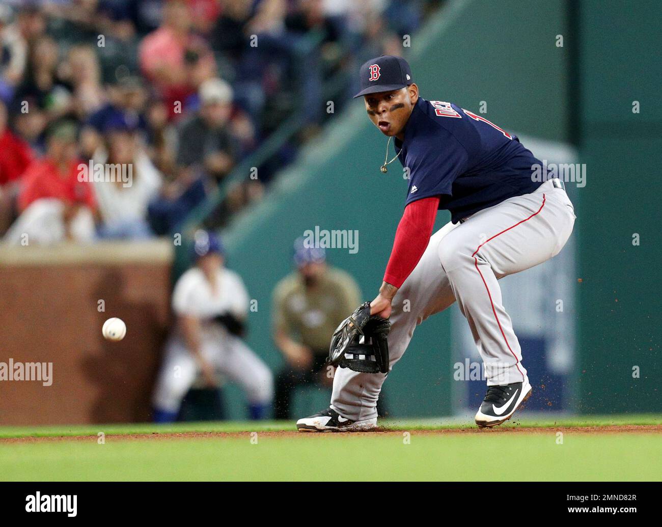 Boston Red Sox third baseman Rafael Devers (11) fields a ground ball ...