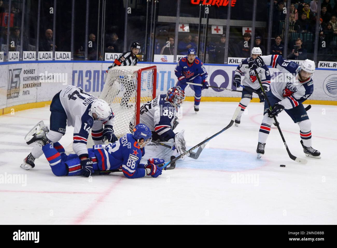 Torpedo Hockey Club player, Ivan Kulbakov (No.35), Andrei Belevich (No.93), Gleb Ivanov (No.14 ...