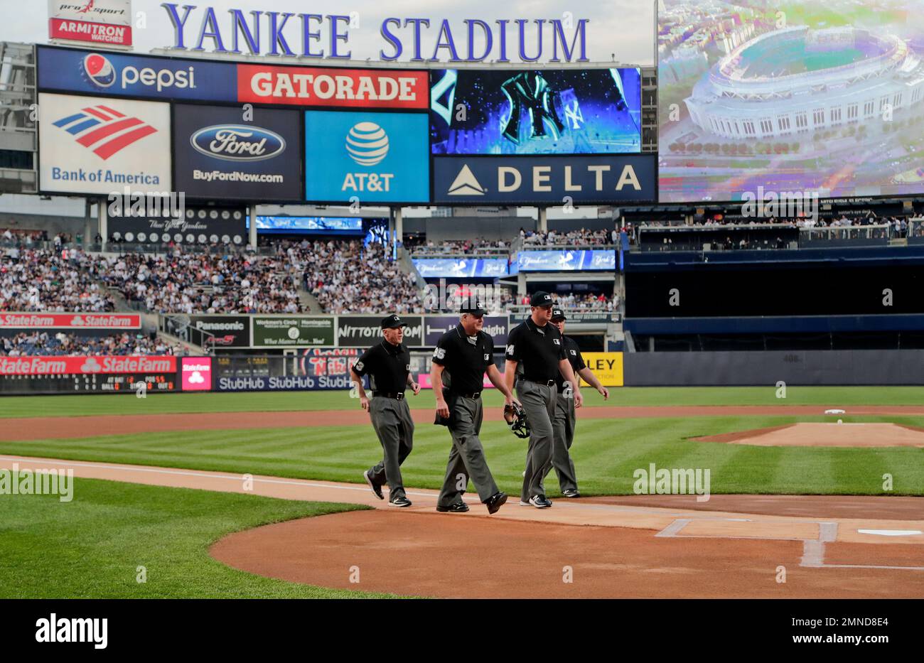 From left, umpires Lance Barksdale, Tim Timmons, Lance Barrett and Tony ...