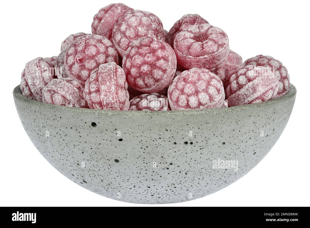 raspberry candies in a concrete bowl isolated on white background Stock ...