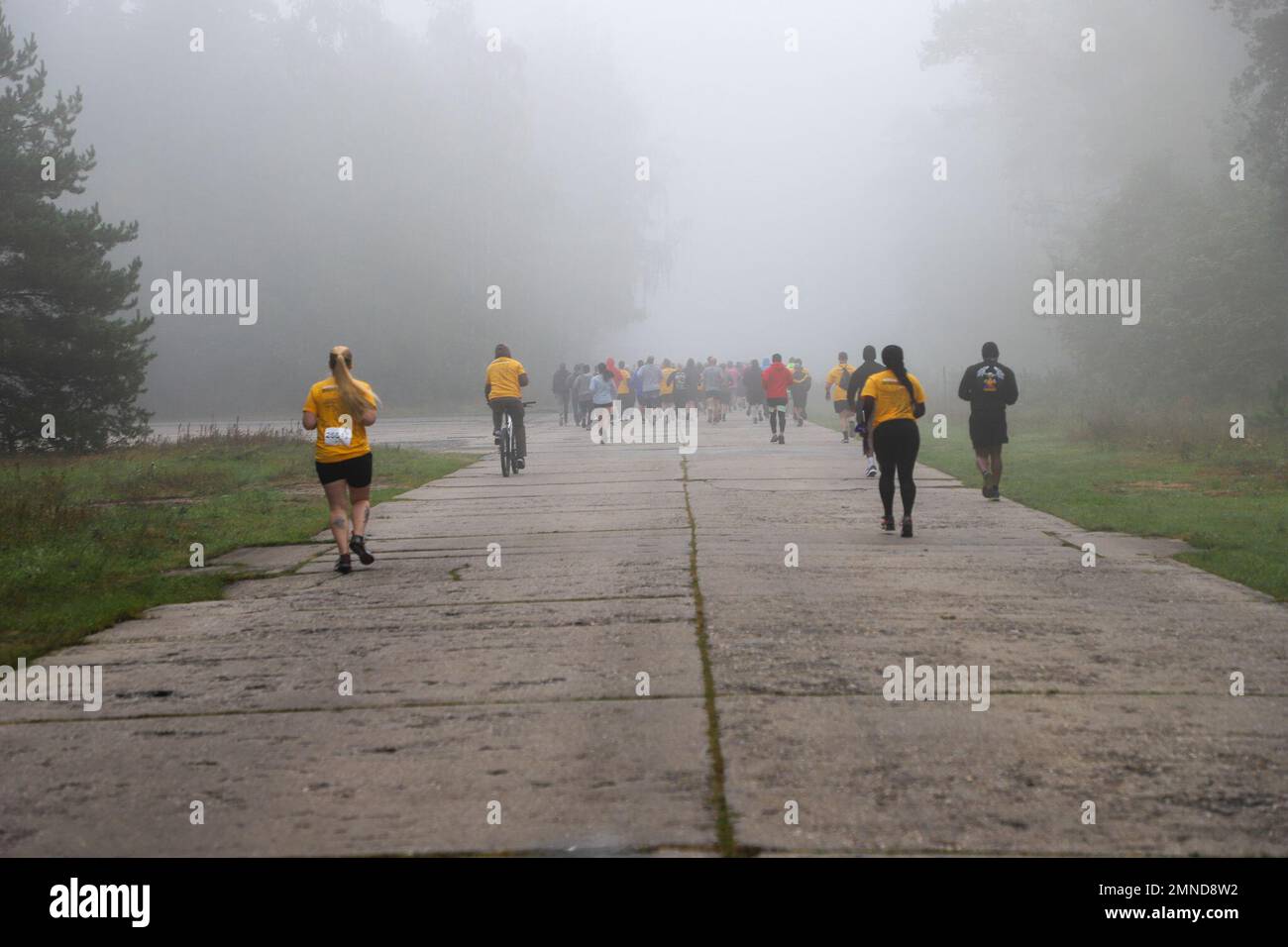Running down the road of the first ever Army 10-miler Shadow run in ...