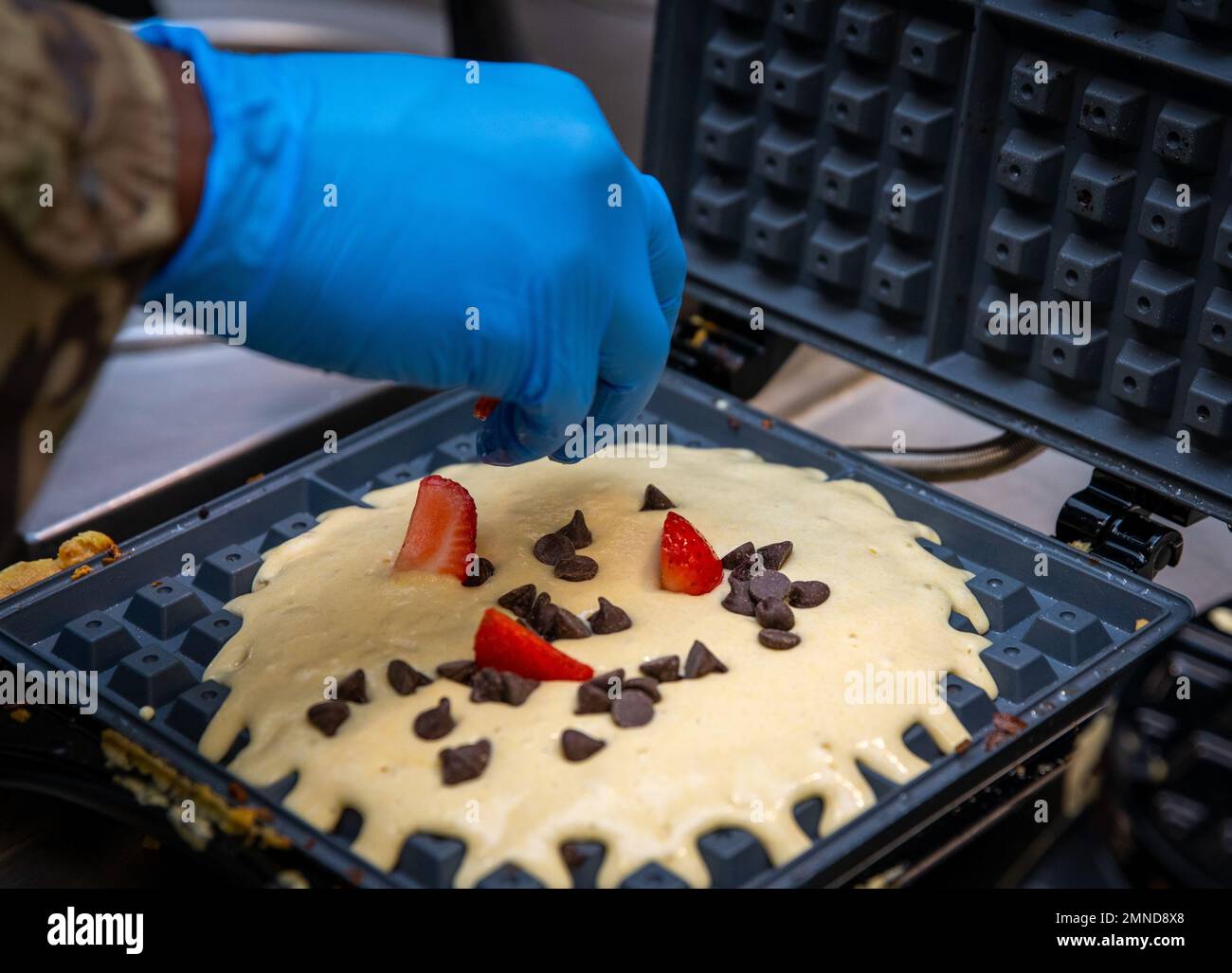 U.S. Army Pfc. Nian Parks, a culinary specialist assigned to the 1st ...