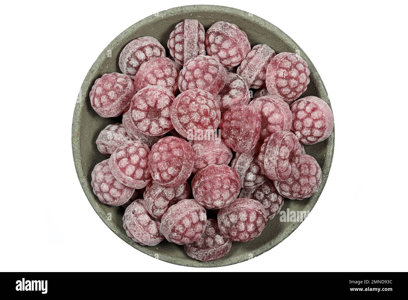 raspberry candies in a concrete bowl isolated on white background Stock ...