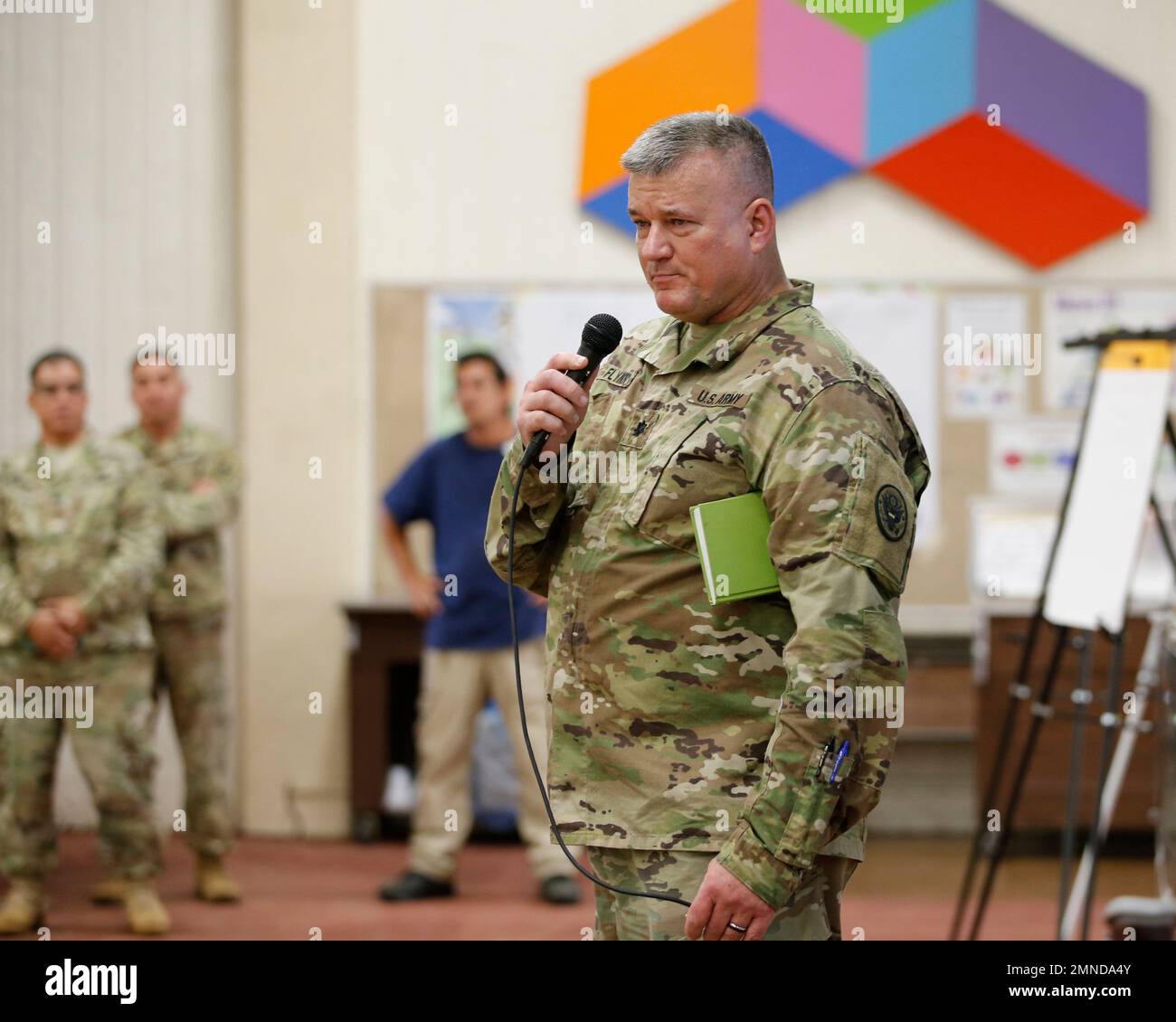 Lt. Col. Bill Flynn of the Hawaii National Guard speaks at a community ...