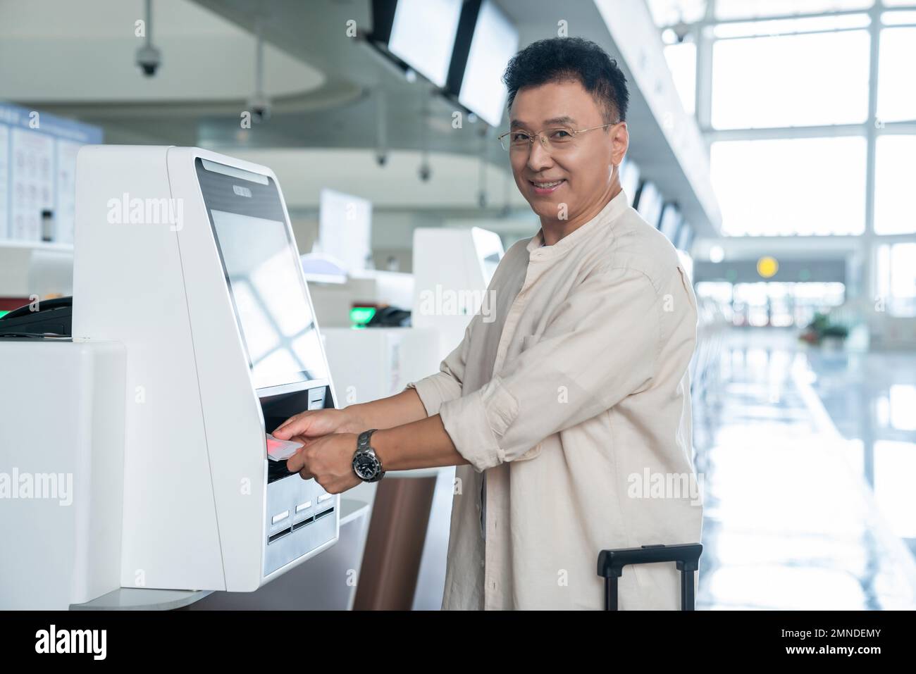 Self check in and airport and adult hi-res stock photography and images ...