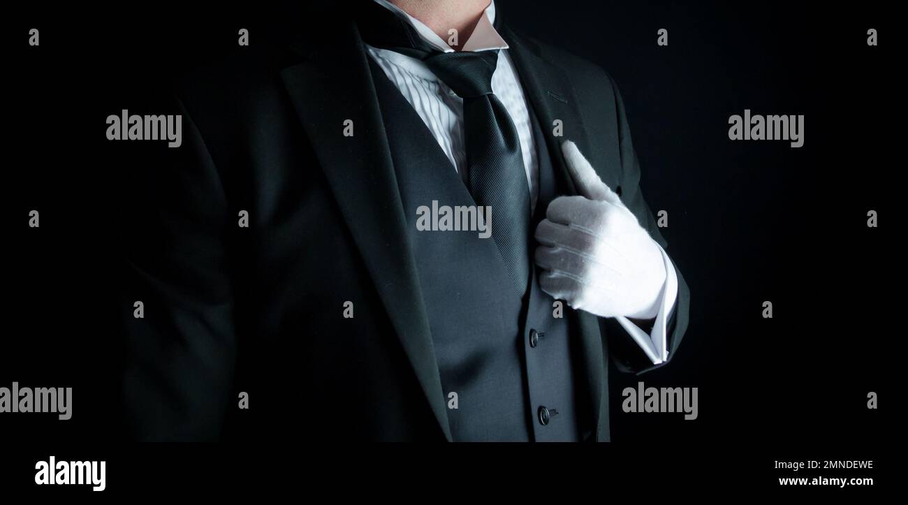 Isolated Close-Up of Butler in Dark Suit and White Gloves Standing at ...