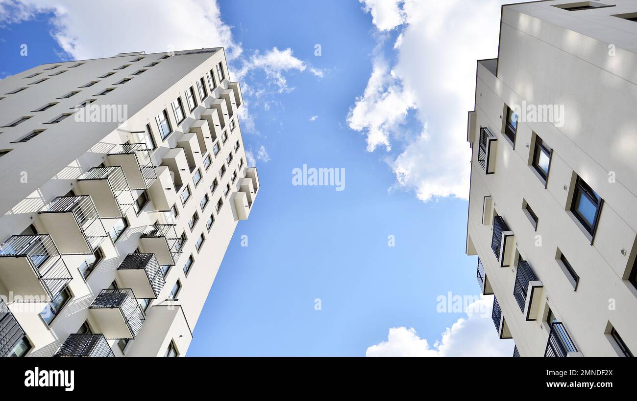 Futuristic square architecture of apartment building. Real estate with ...