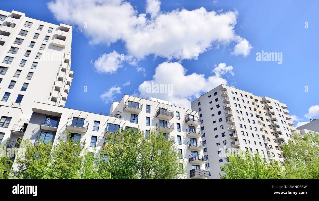 Futuristic square architecture of apartment building. Real estate with ...