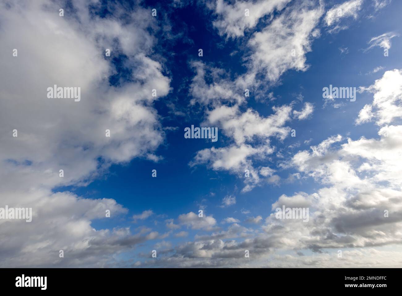 Blue sky background with clouds in The Netherlands Stock Photo - Alamy