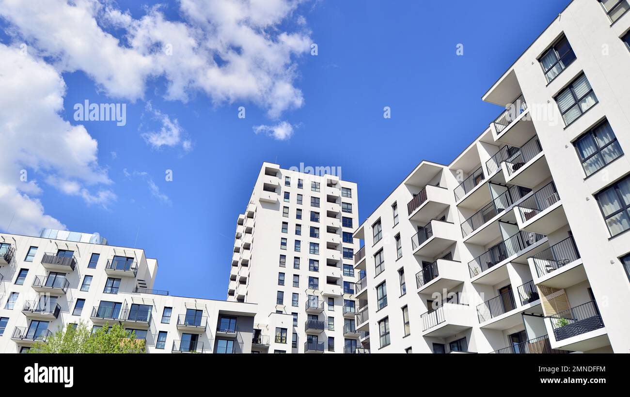 Futuristic square architecture of apartment building. Real estate with ...