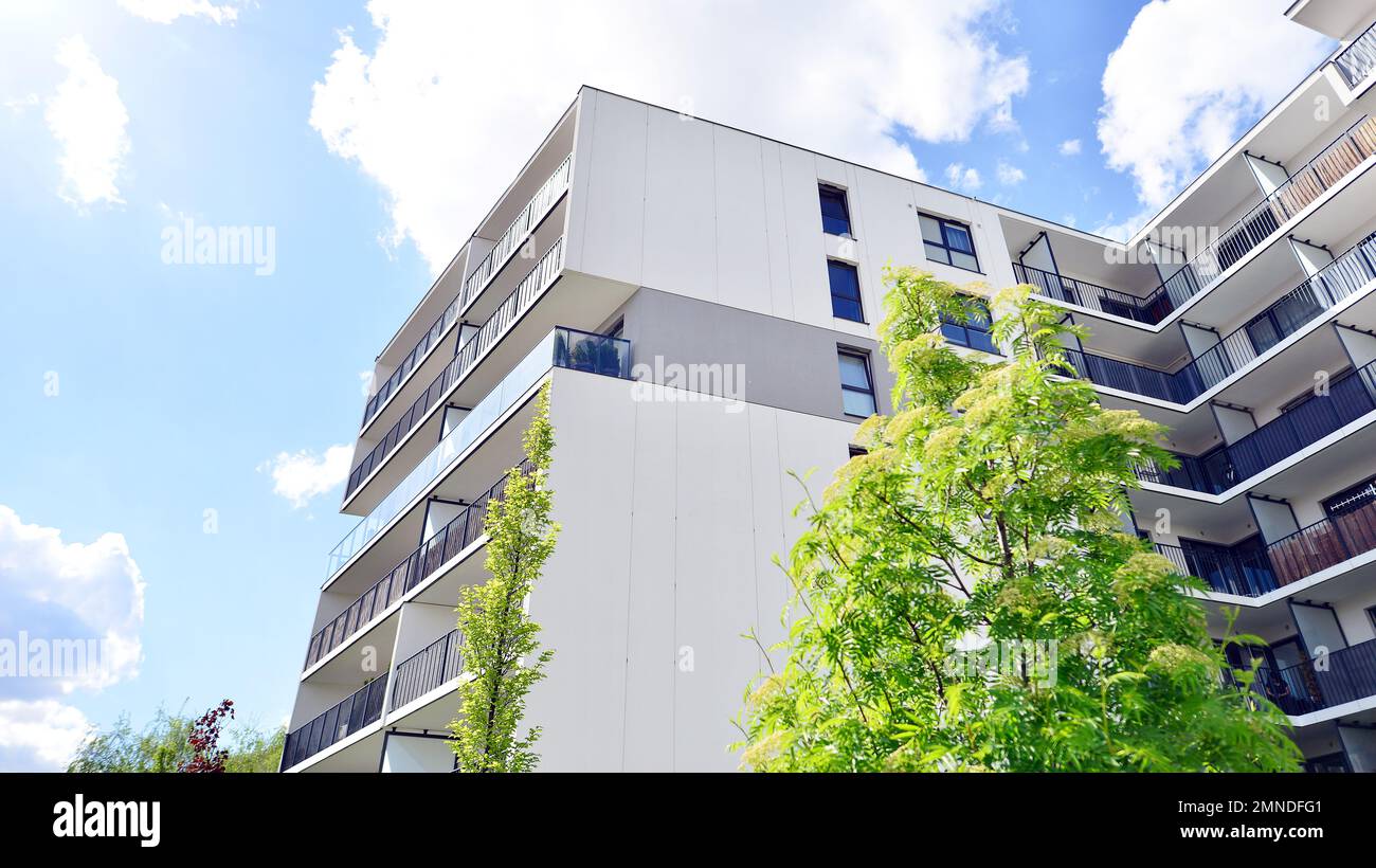 Futuristic square architecture of apartment building. Real estate with ...