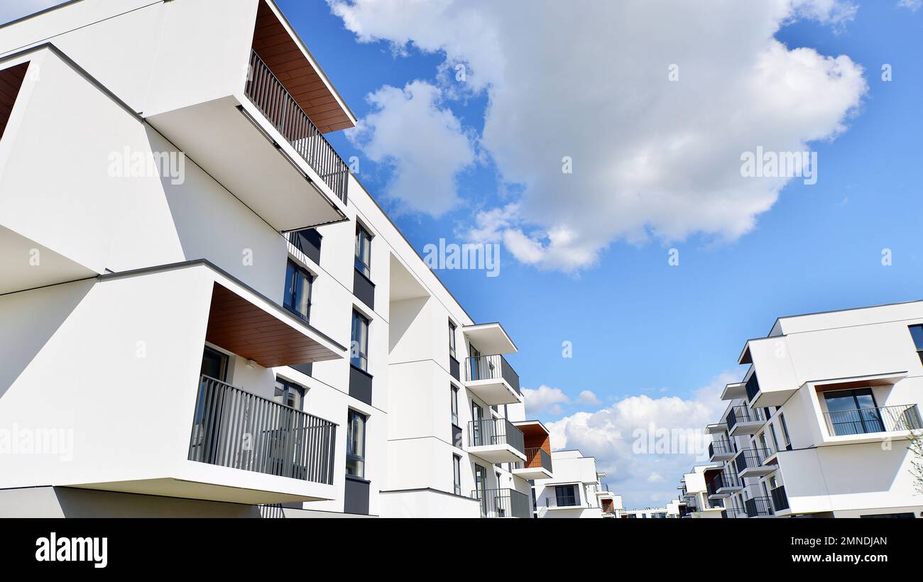 Futuristic square architecture of apartment building. Real estate with ...