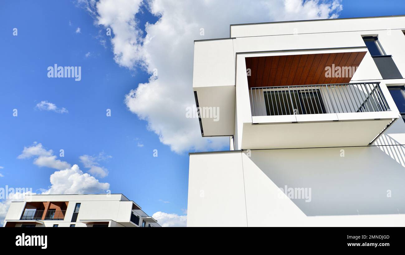 Futuristic square architecture of apartment building. Real estate with ...