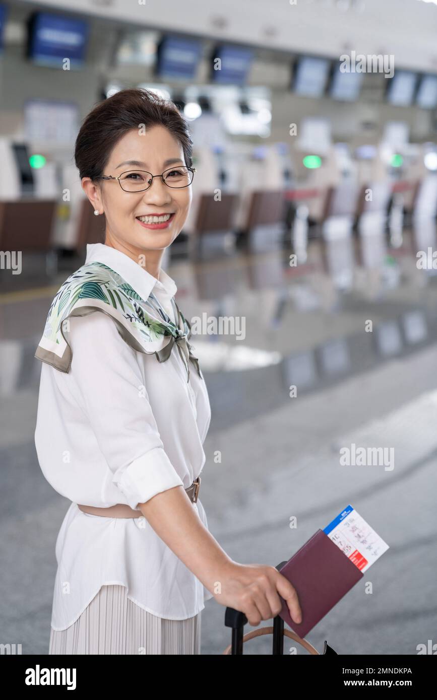 Asian elderly airport hi-res stock photography and images - Alamy