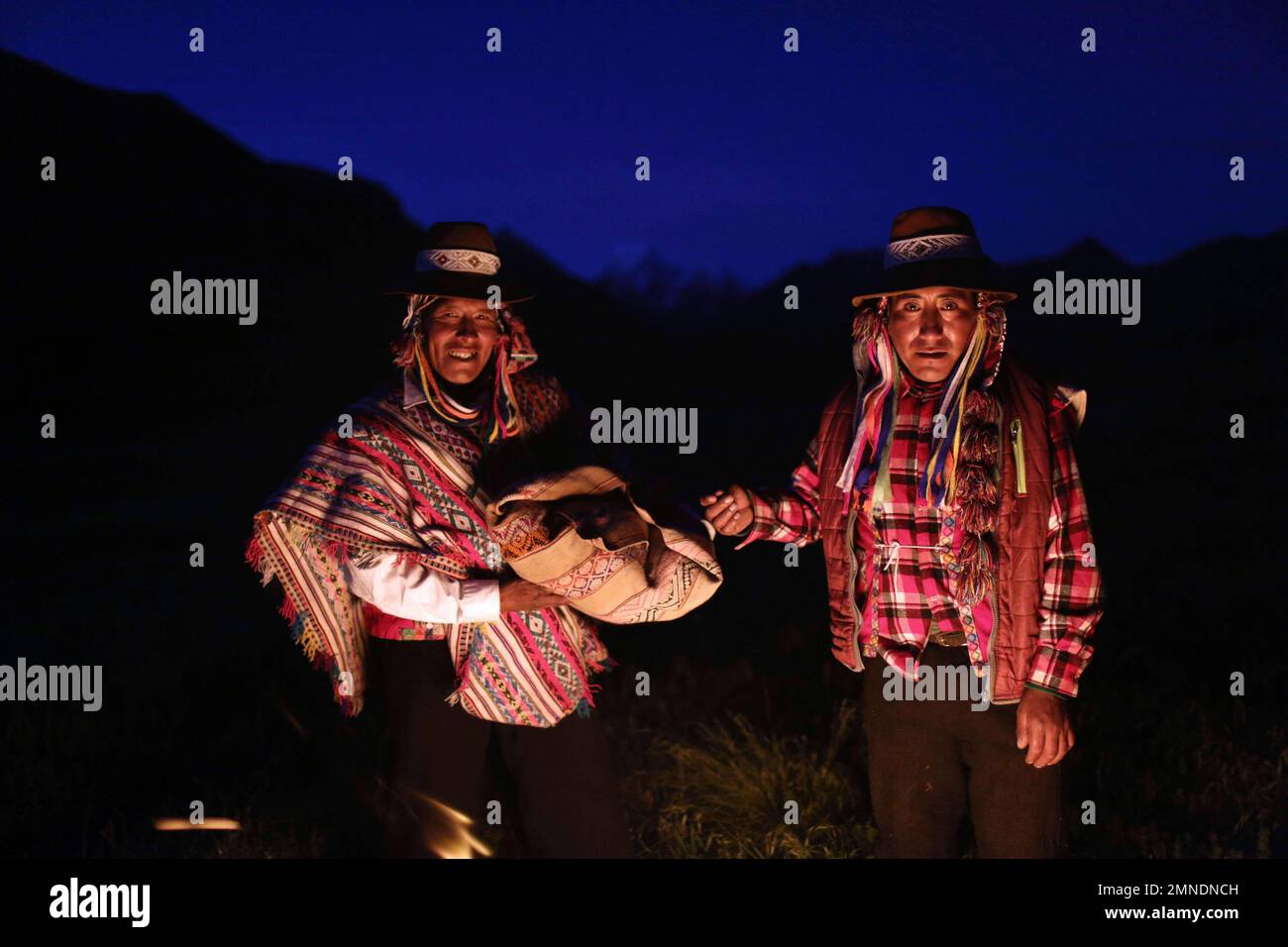 In this April 4, 2018 photo, Andean farmers pose for a portrait during ...