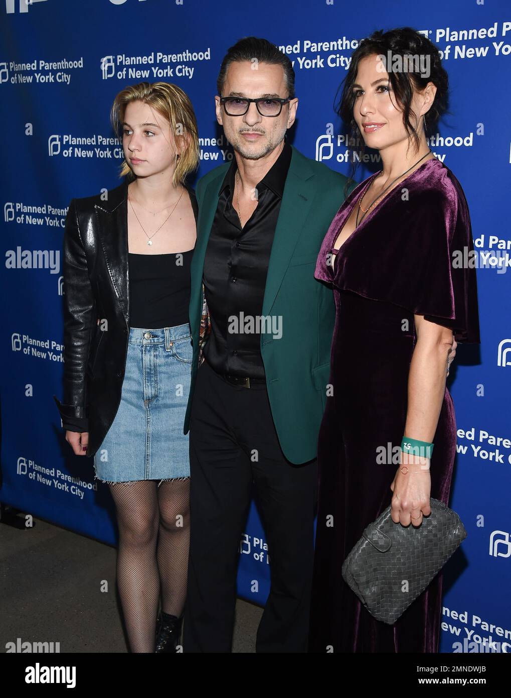 Singer Dave Gahan, center, poses with his daughter Stella, left, and ...