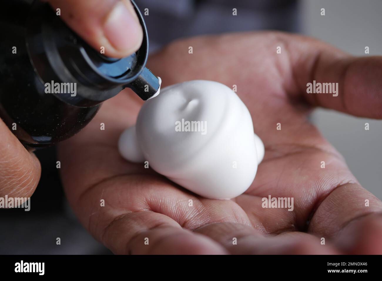 top view of shaving foam on hand Stock Photo - Alamy