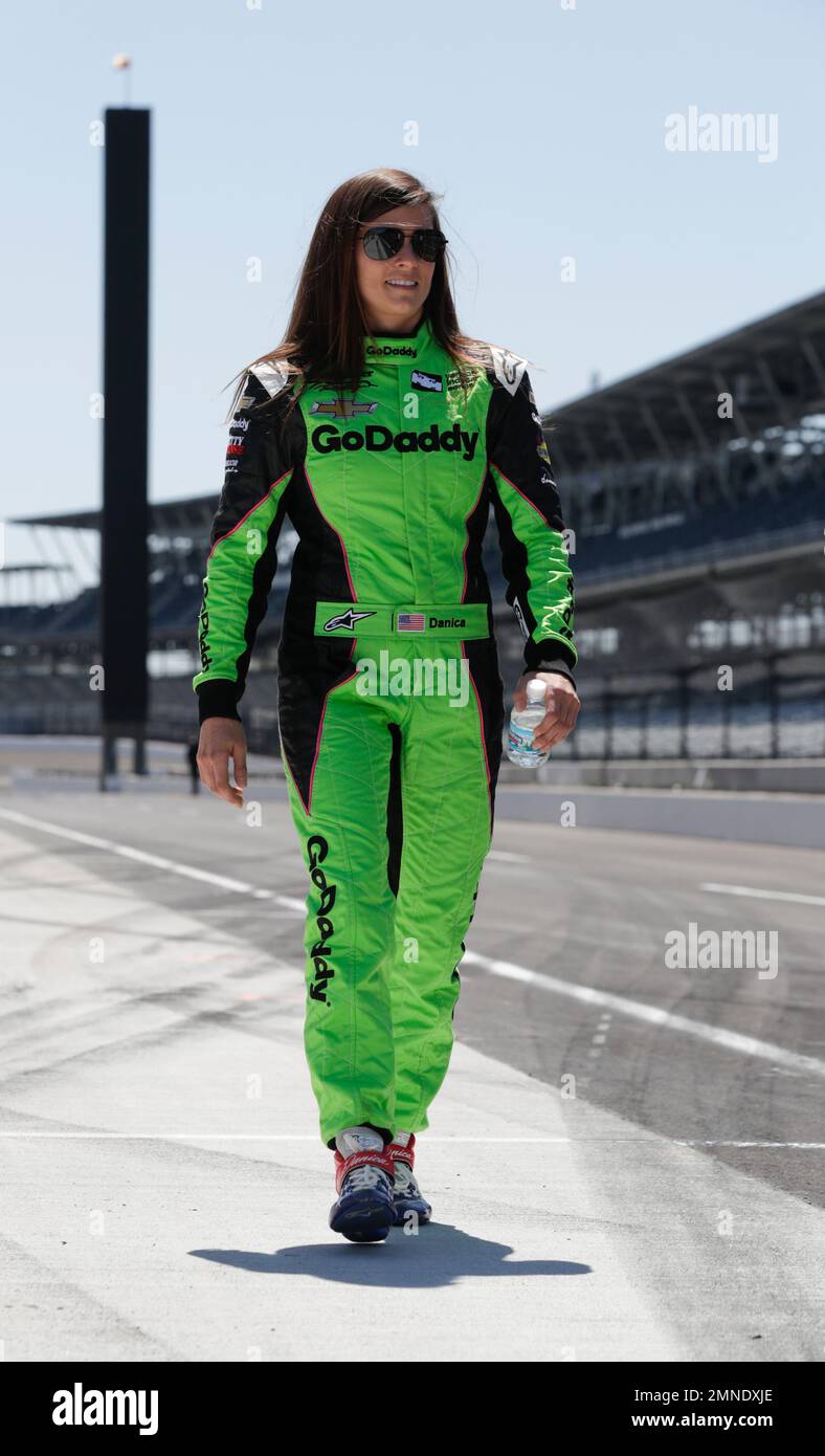 IndyCar driver Danica Patrick walks through the pit area as she ...