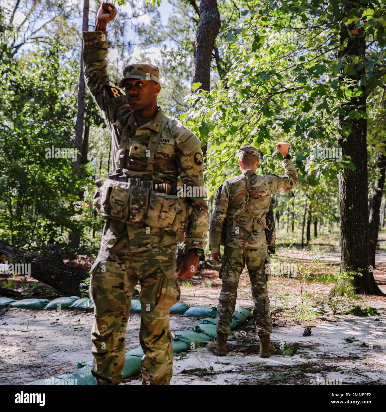 U.S. Army Spc. Derico Coggins, left, and Spc. Devin Gonzalez ...