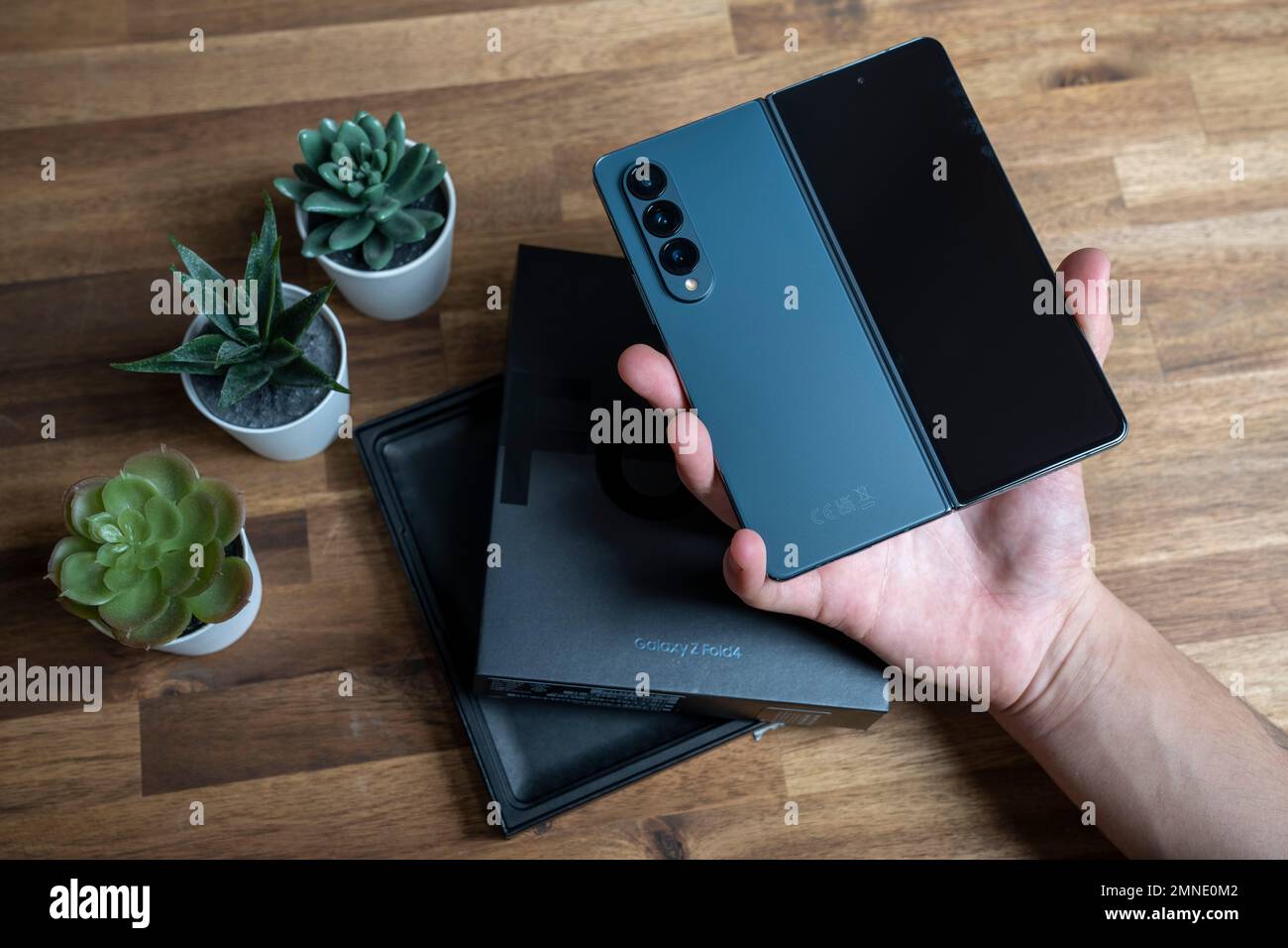 Samsung Galaxy Z Fold 4 in gray-green color. The device in the open ...