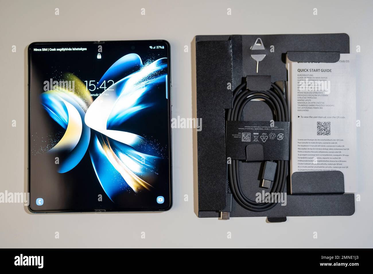 Brand new Samsung Galaxy Z Fold 4 in grey-green color. The device is in ...