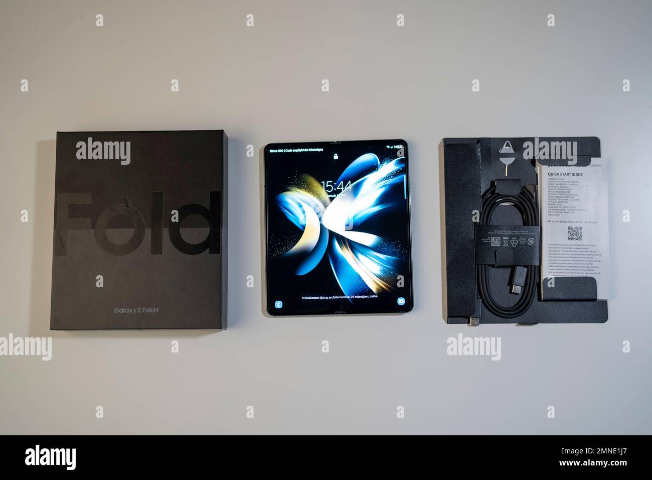 Brand new Samsung Galaxy Z Fold 4 in grey-green color. The device is in ...