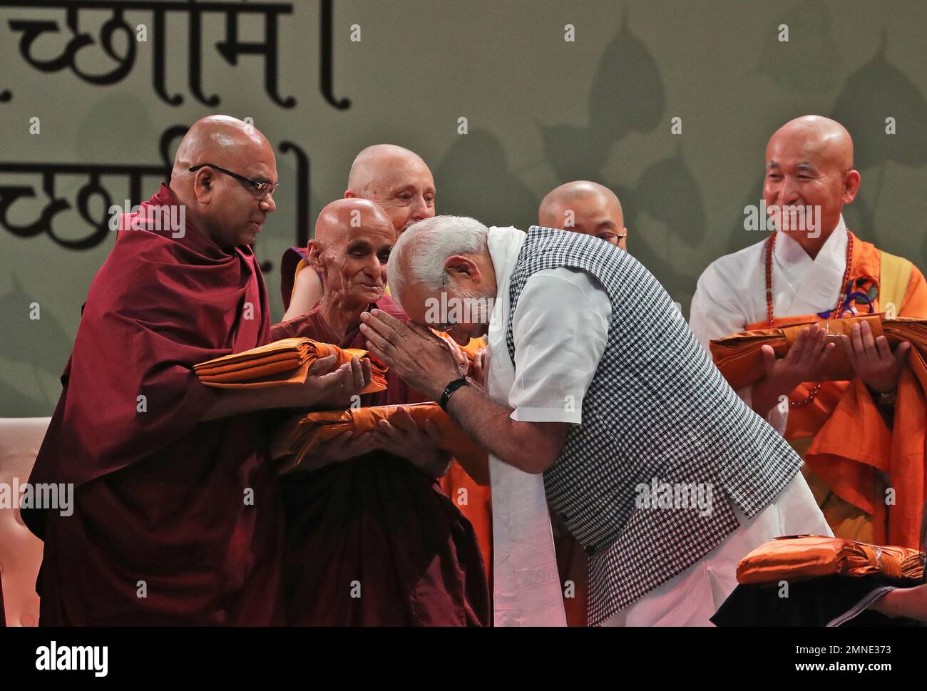 Indian Prime Minister Narendra Modi greets Buddhist monks after ...