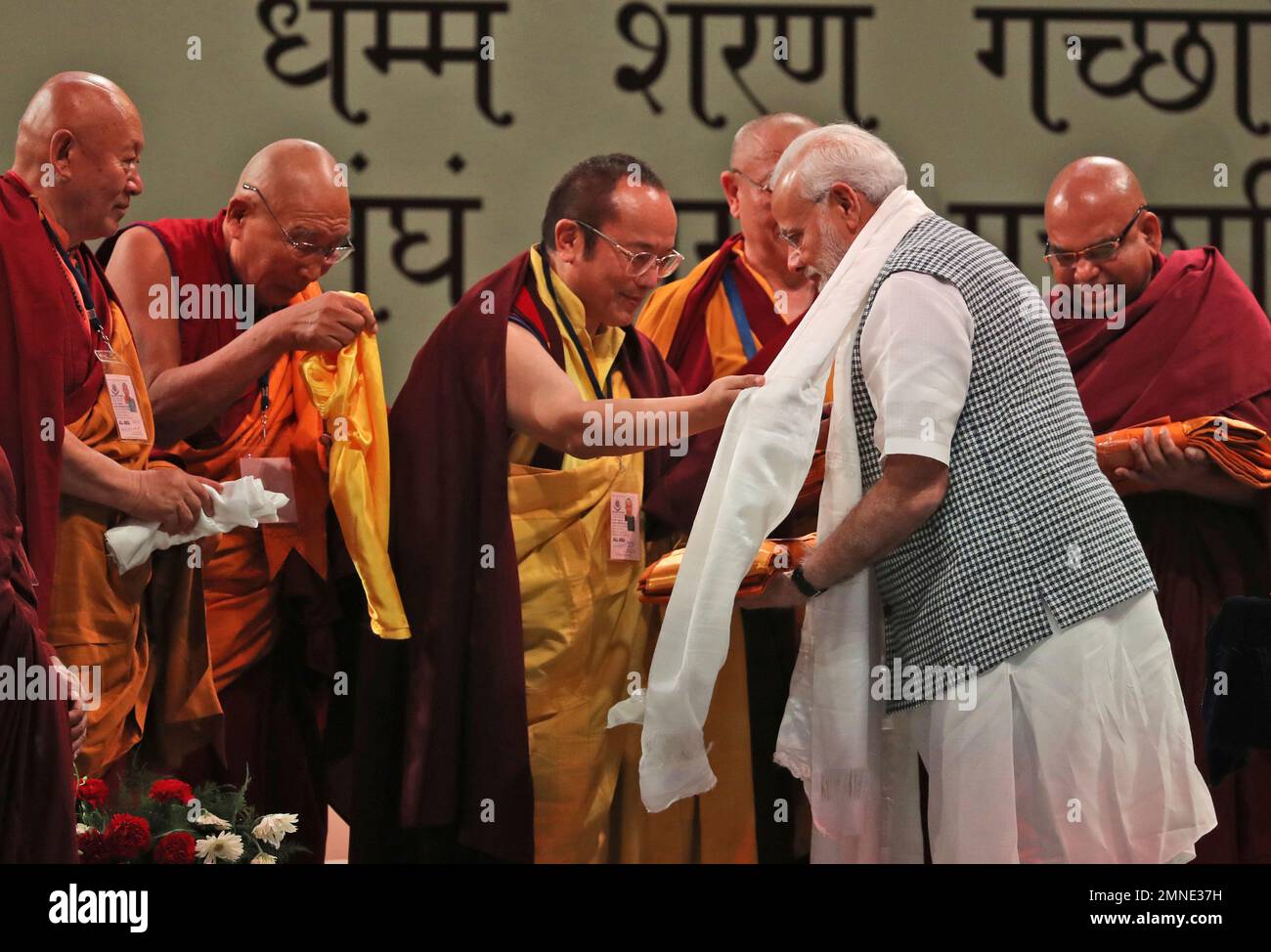 Buddhist monks greet Indian Prime Minister Narendra Modi during Buddha ...