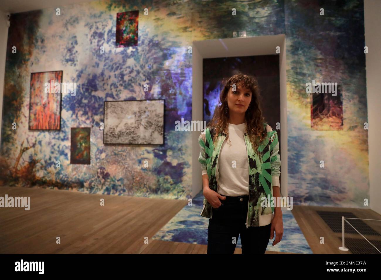 Swiss artist Maya Rochat poses for photographers in front of her ...