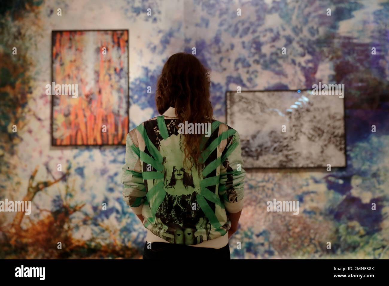 Wearing a jacket she designed with an image of herself on the back with ...