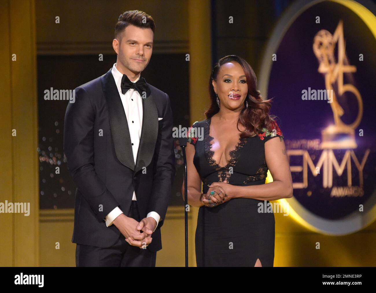 AJ Gibson, left, and Vivica A. Fox present the award for outstanding ...