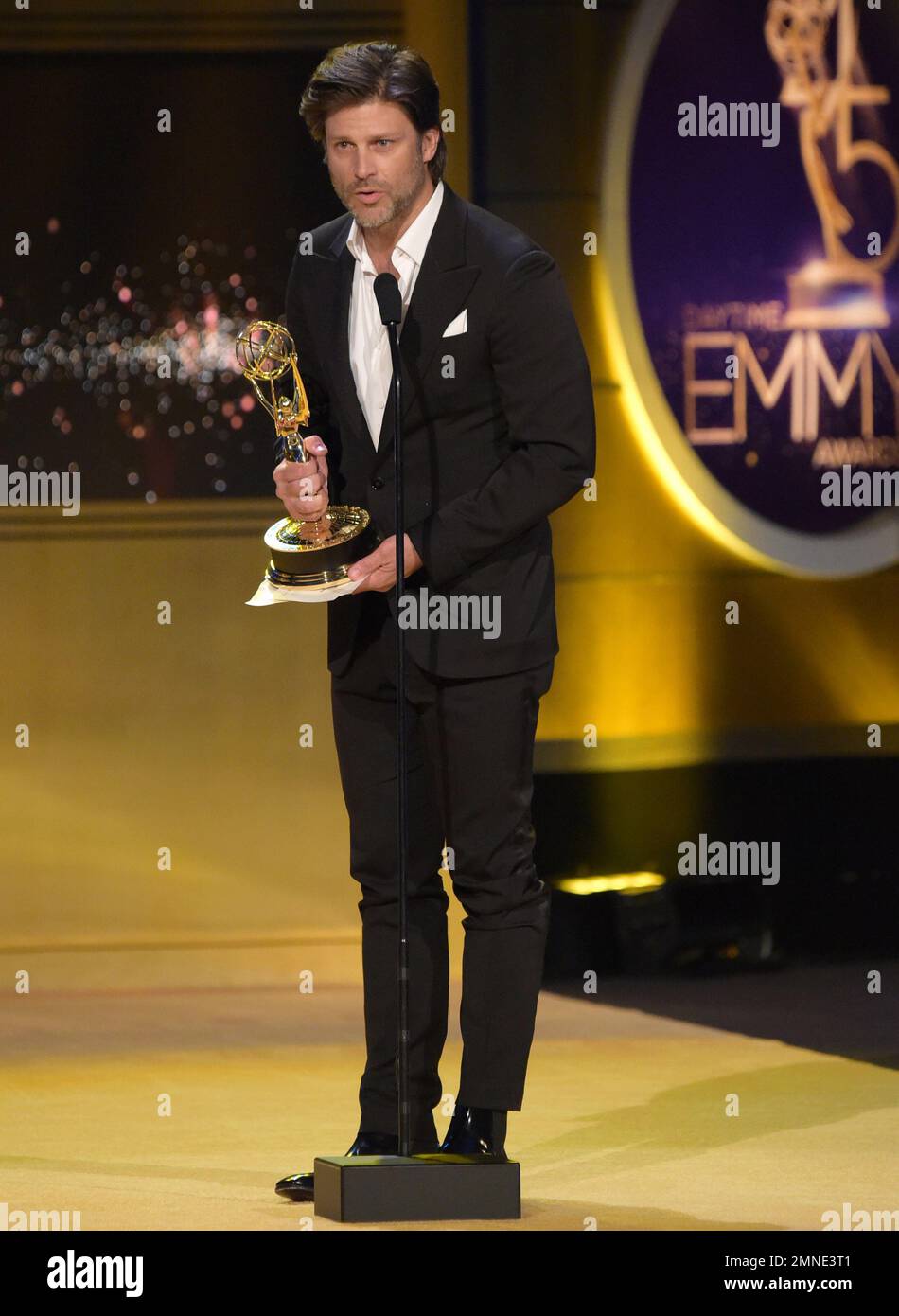 Greg Vaughn accepts the award for outstanding supporting actor in a ...