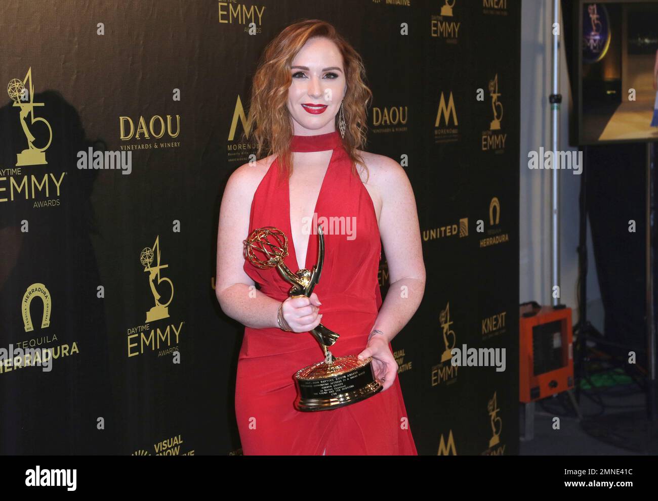 Camryn Grimes poses in the press room with the award for outstanding ...