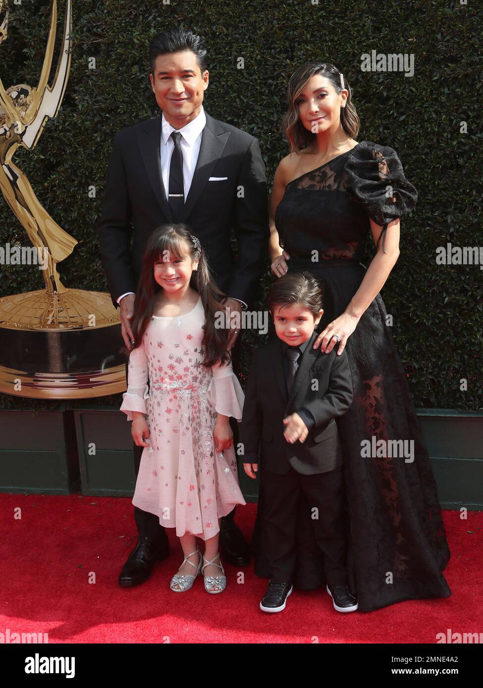 Mario Lopez, from left, Courtney Laine Mazza, Gia Francesca Lopez, and ...