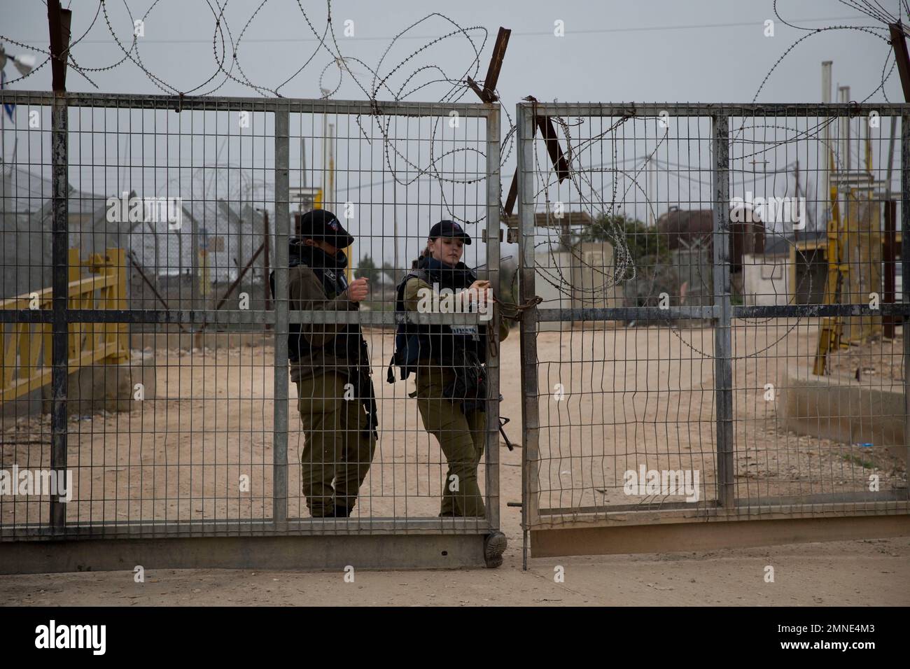 In this Sunday, Feb. 11 2018 photo, Israeli soldiers close the gate of ...