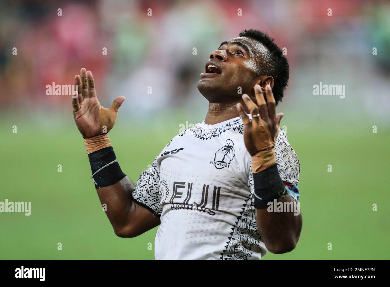Fiji's Jerry Tuwai celebrates after scoring the third try against ...