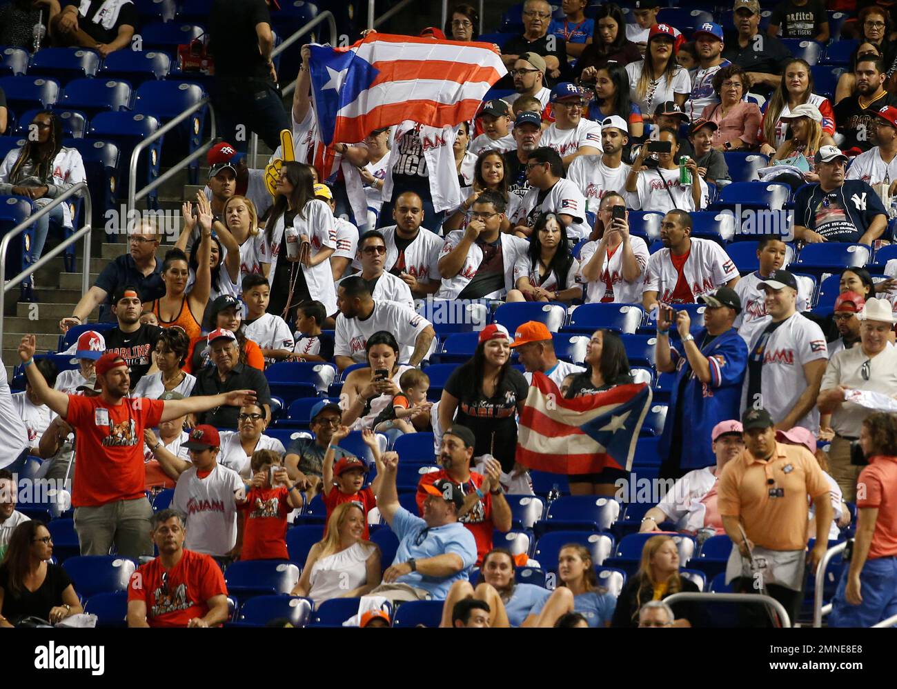 Fans wave Puerto Rican flags and chant during Puerto Rican Heritage ...