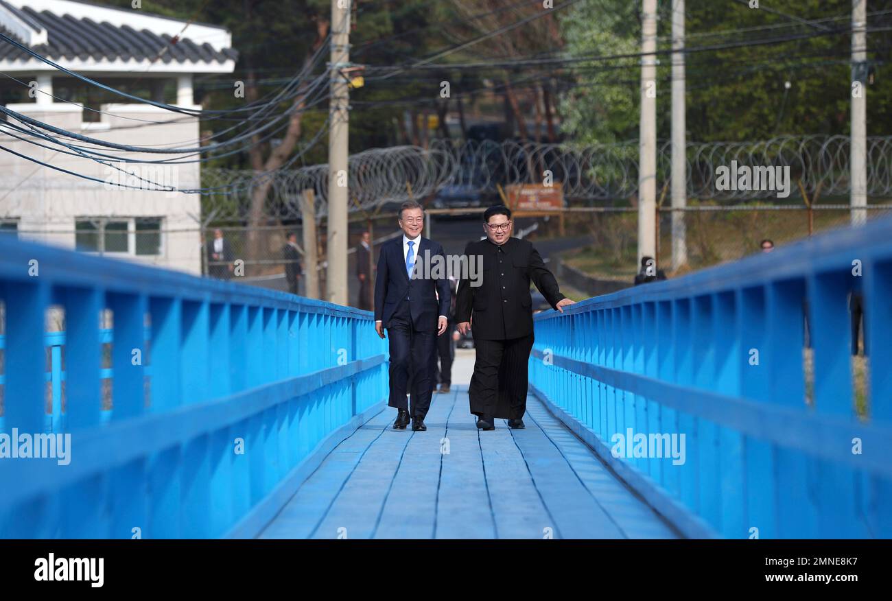 North Korean leader Kim Jong Un, right, and South Korean President Moon ...