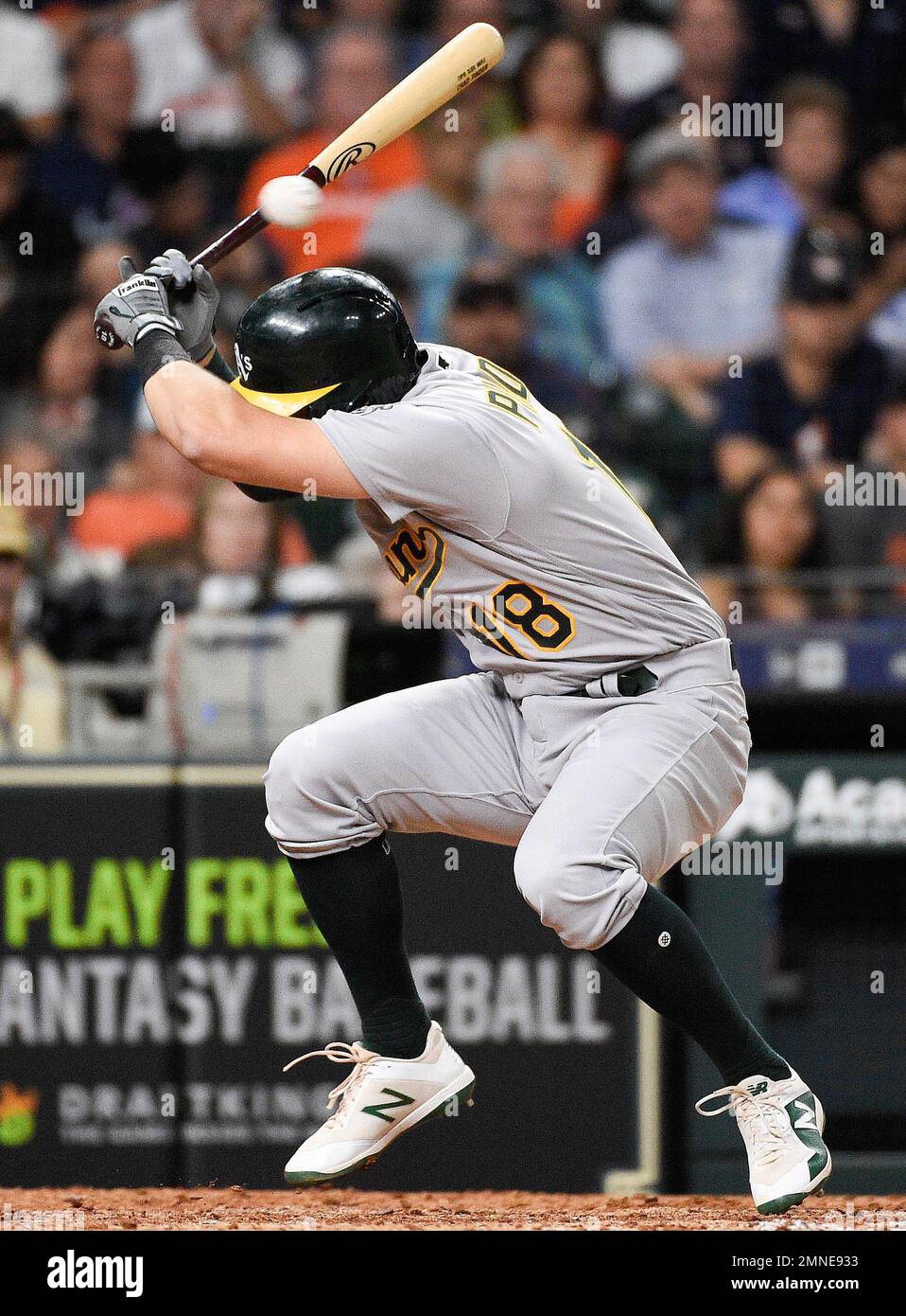 Oakland Athletics' Chad Pinder ducks under a pitch from Houston Astros ...