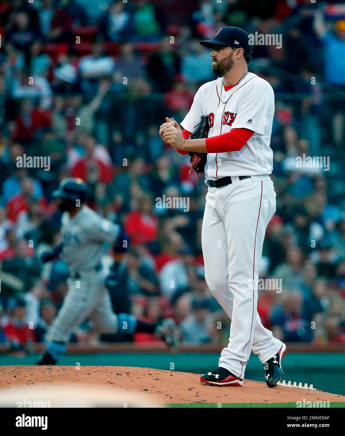 Boston Red Sox's Heath Hembree stands on the mound after giving up a ...