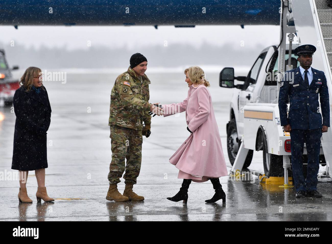 First lady Jill Biden, right, is greeted by Major General Gregory K ...