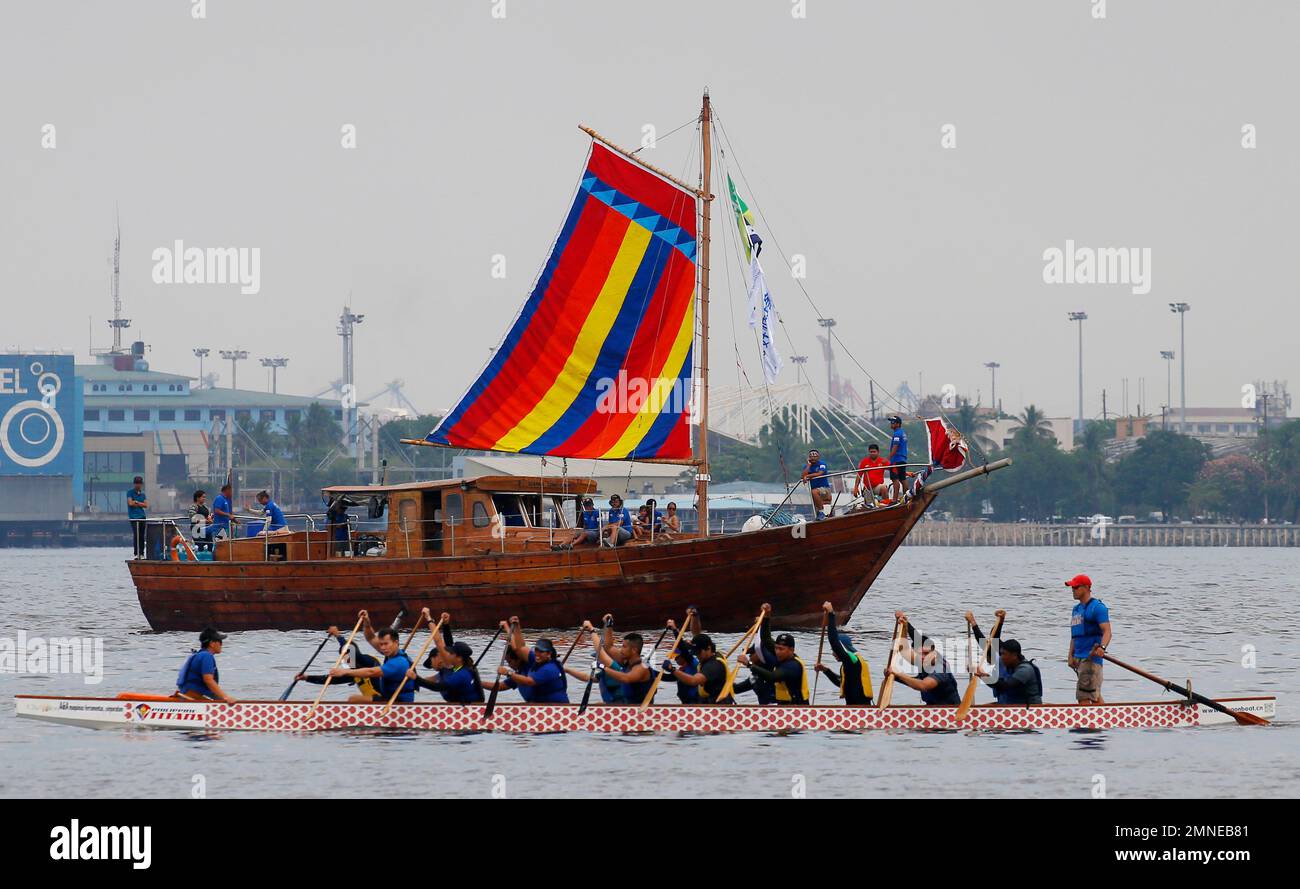 Crewmen of "Lahi Ng Maharlika" a wooden plank boat which is the exact ...