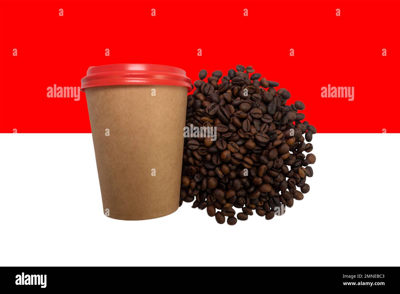 Cup and a handful of roasted coffee beans against the background of the ...