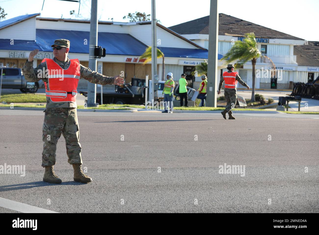 Soldiers with the 1-265th Air Defense Artillery (ADA), provide traffic ...