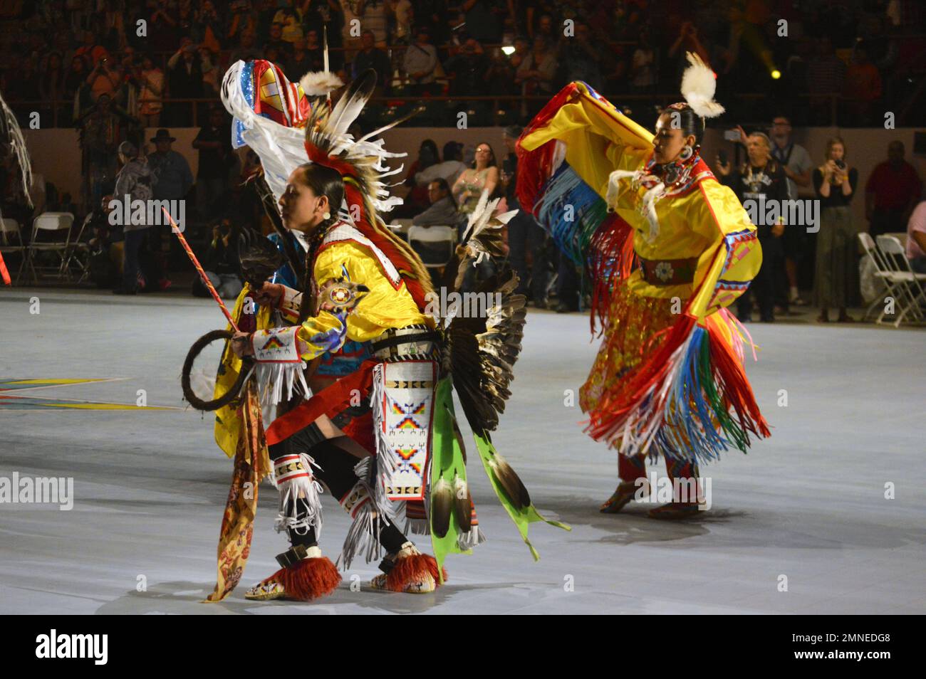 Dancers enter at the Gathering of Nations, one of the world's largest ...
