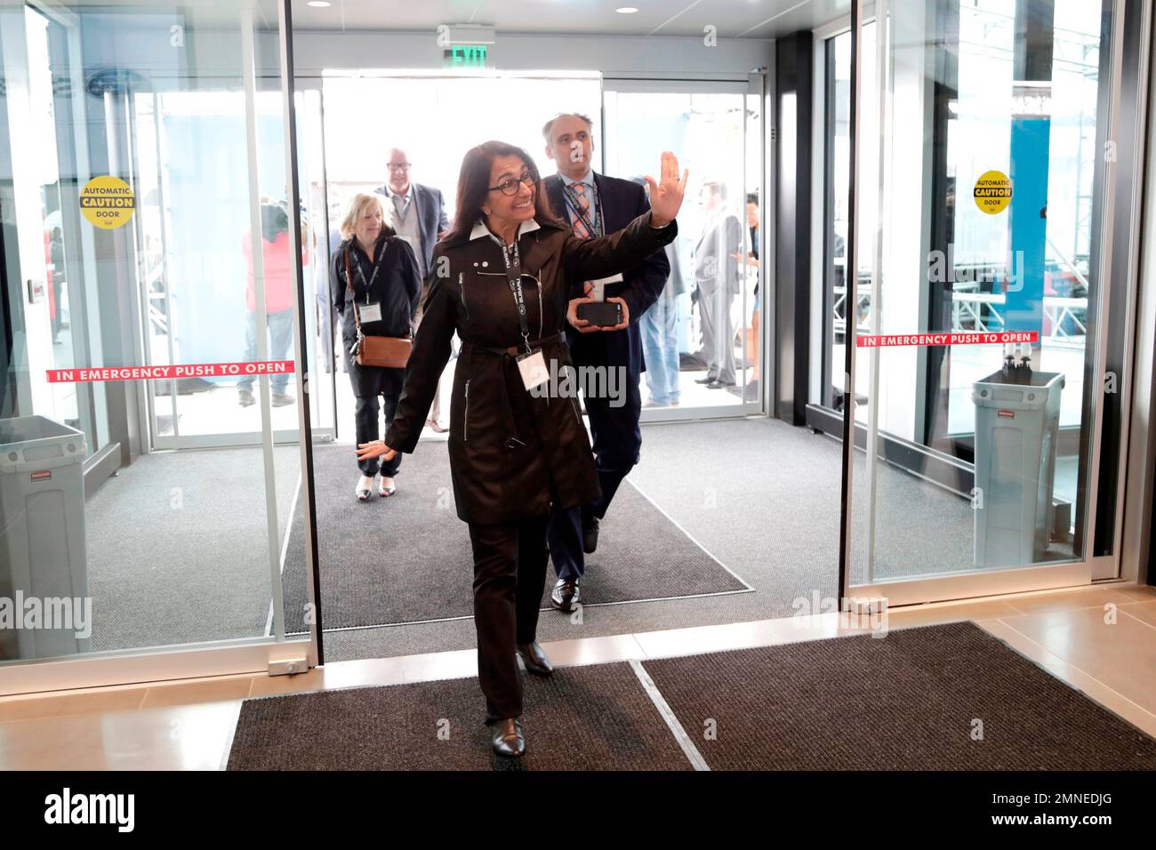 People enter into the lobby of the Subaru of America headquarters ...