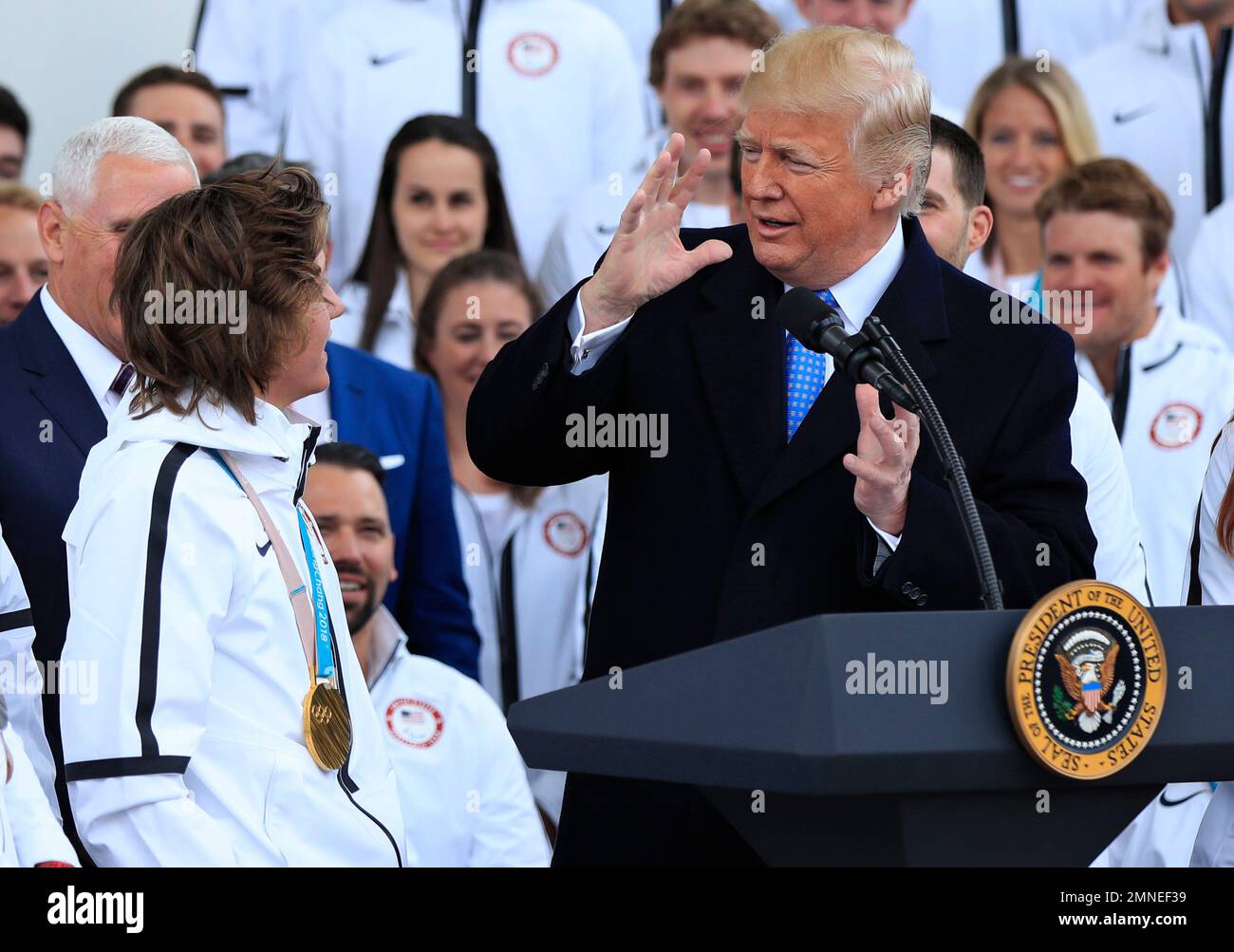 Olympic gold medalist snowboarder Redmond Gerard, left, listens to ...